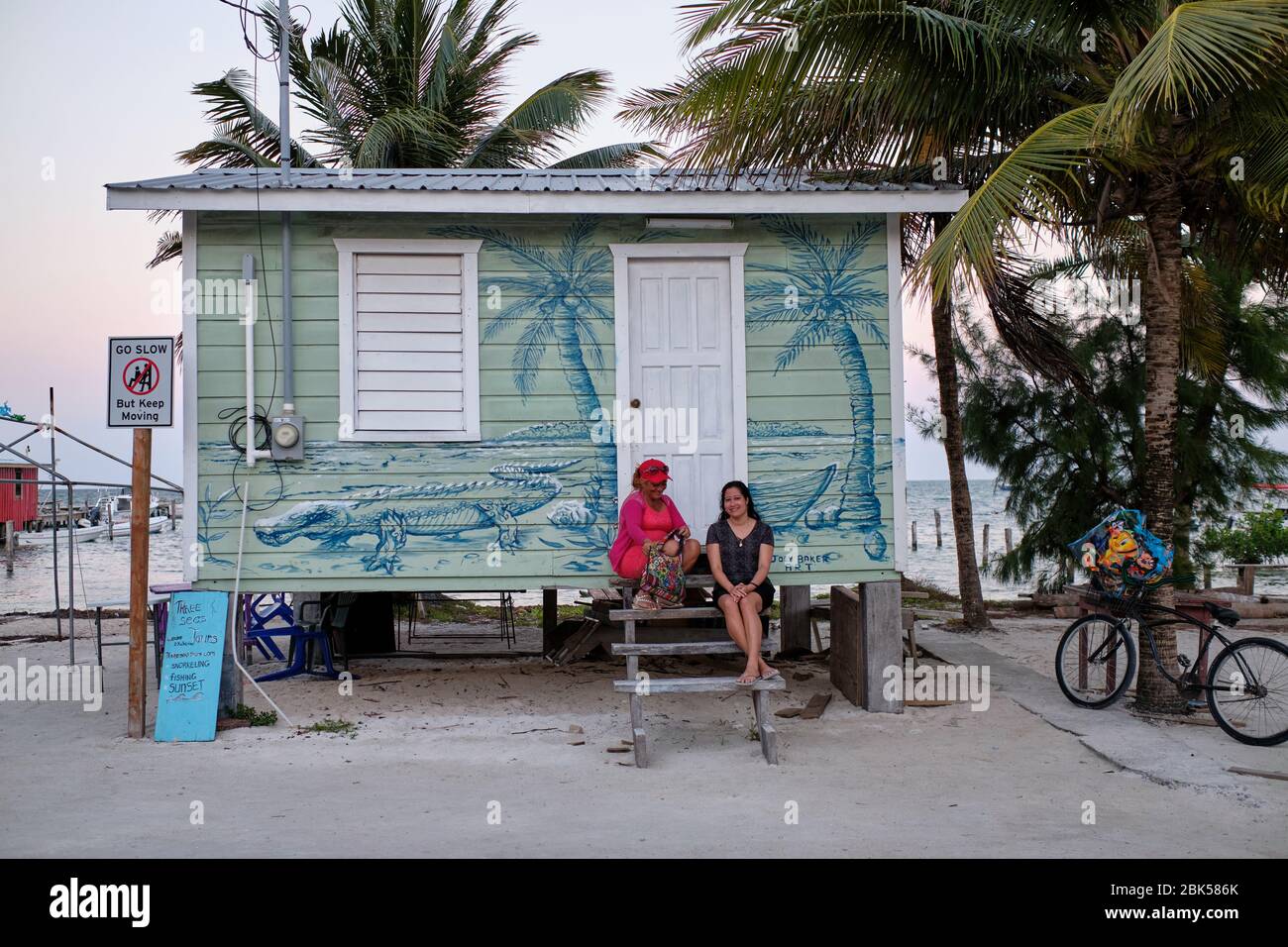 Women under the palm trees hi-res stock photography and images - Alamy