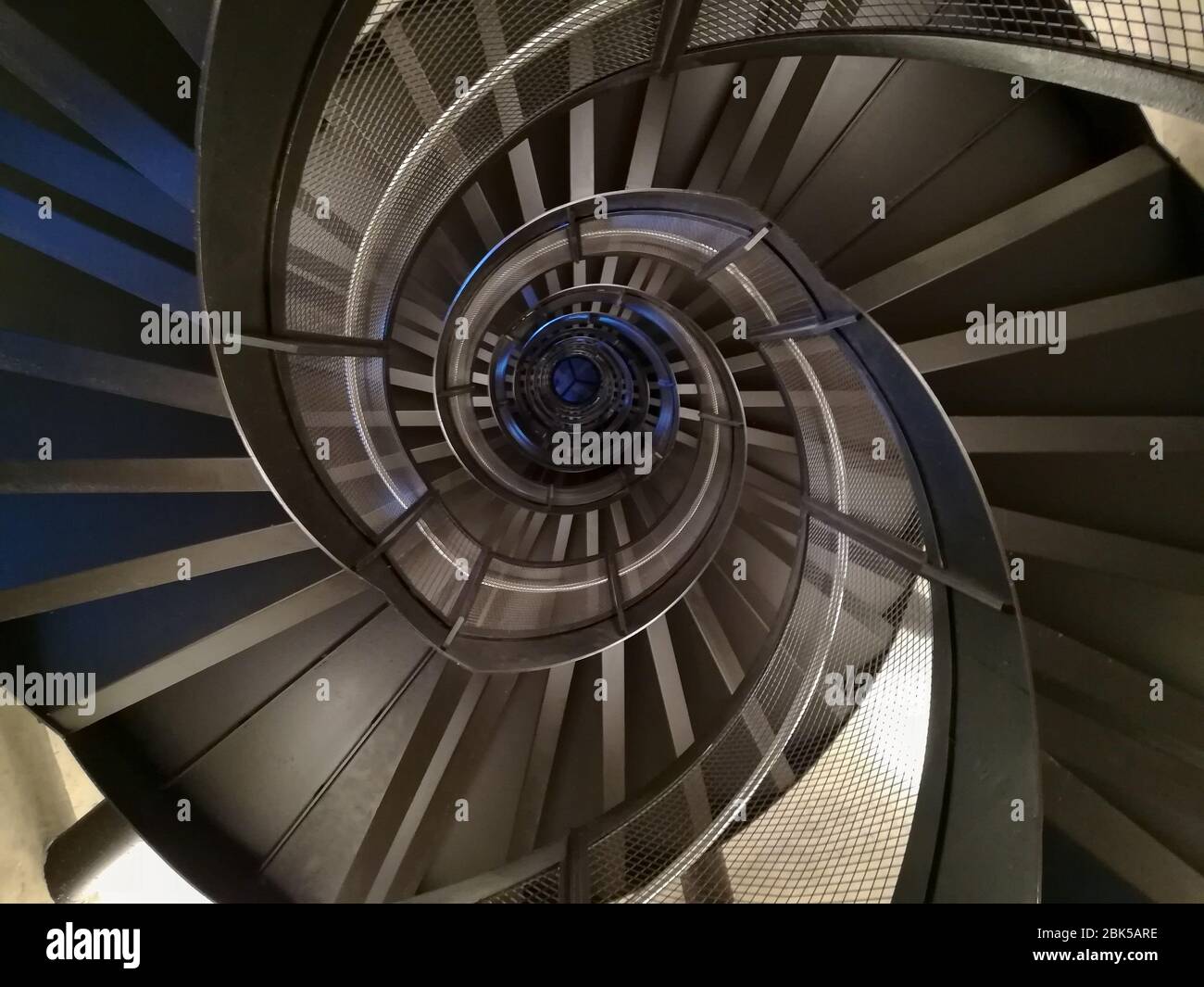 Spiral staircase bottom view. Geometric background Stock Photo - Alamy