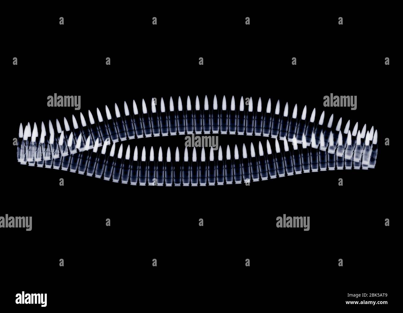 Bullets on a belt, X-ray Stock Photo - Alamy