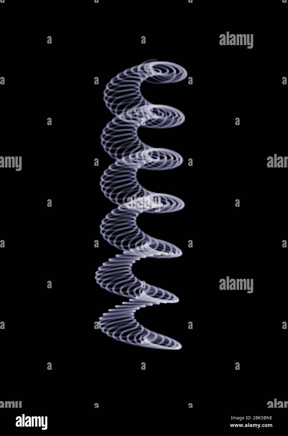 Curled spring toy, X-ray Stock Photo - Alamy