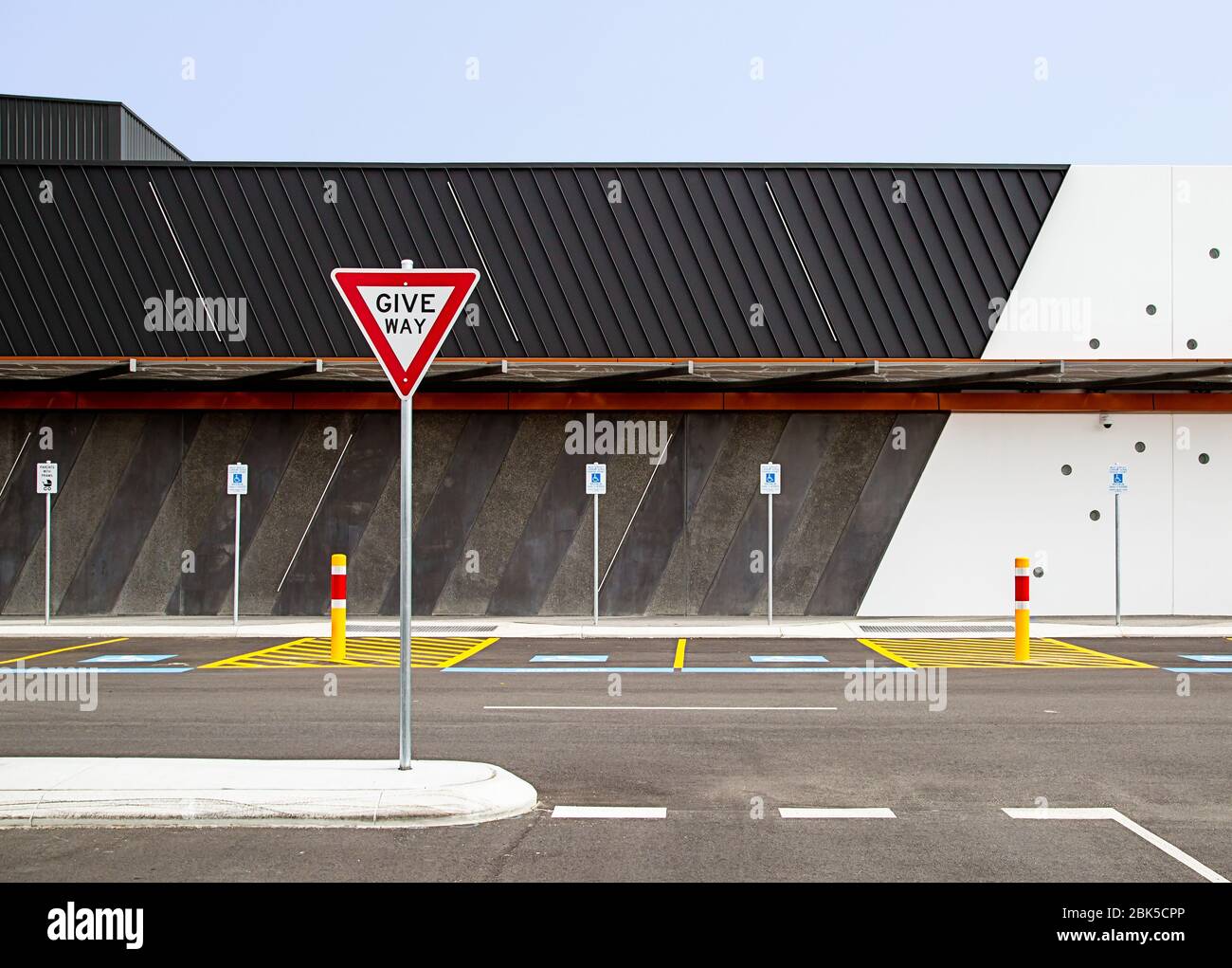 Urban images of a new large commercial building with road markings and ...