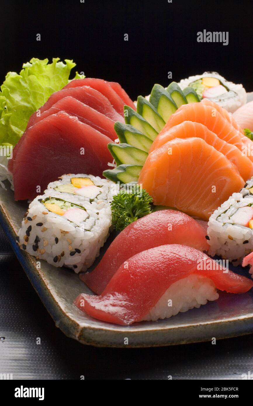 typical Japanese food in decorated and colorful dishes, Sushi and ...