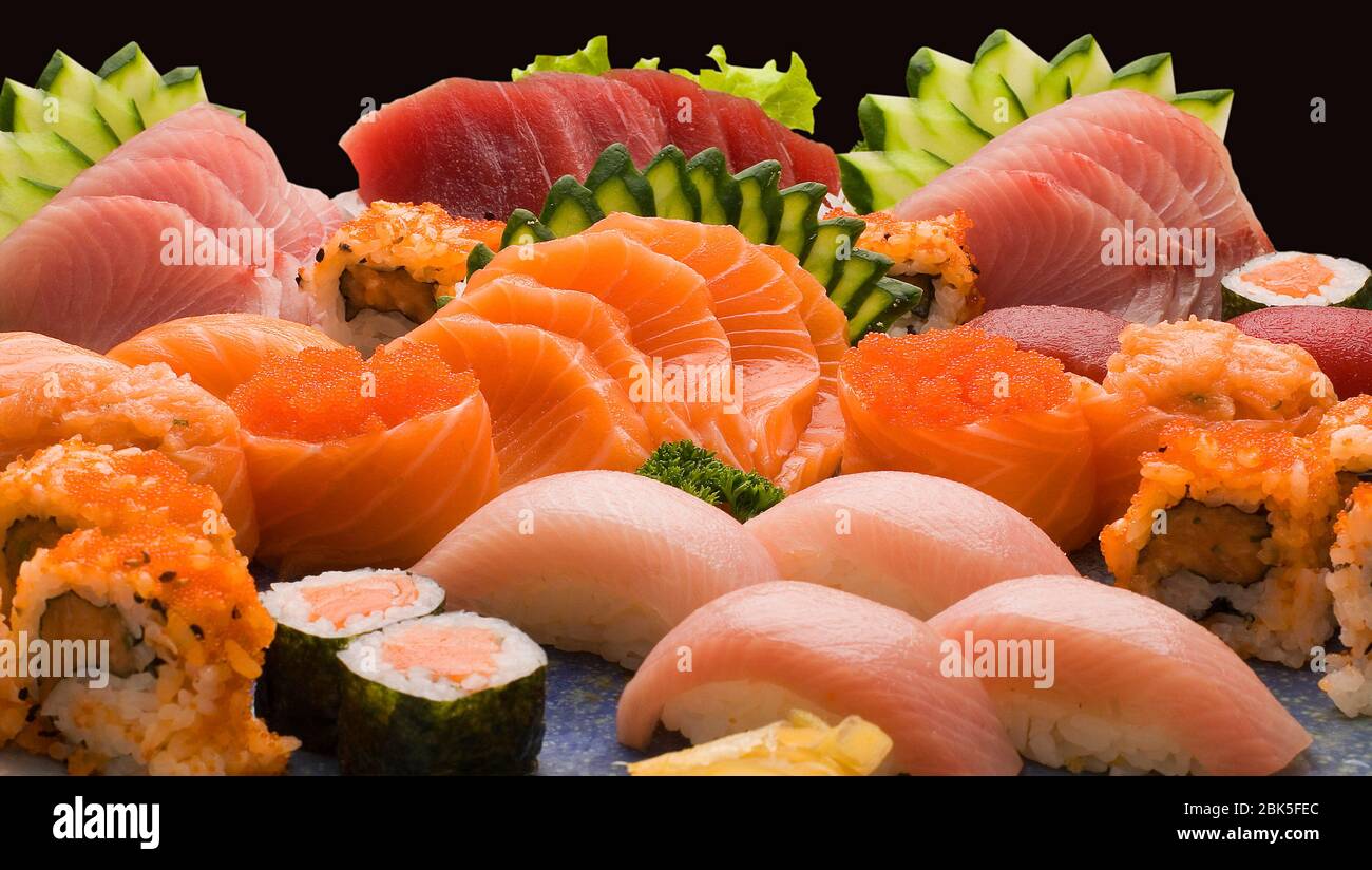 typical Japanese food in decorated and colorful dishes, Sushi and ...