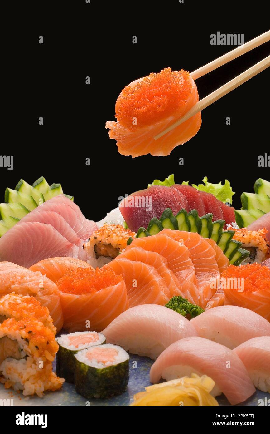 typical Japanese food in decorated and colorful dishes, Sushi and ...