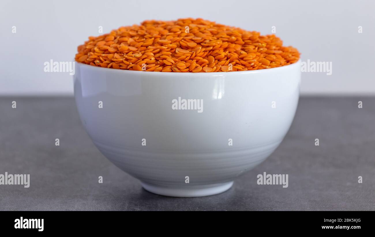Bowl of Dhal seeds front view Neutral background with negative space to ...