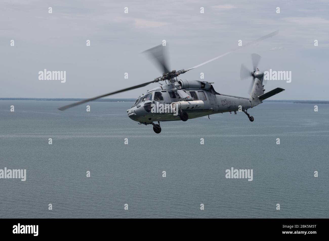 An MH-60S Sea Hawk, attached to the Dragon Whales of Helicopter Sea ...