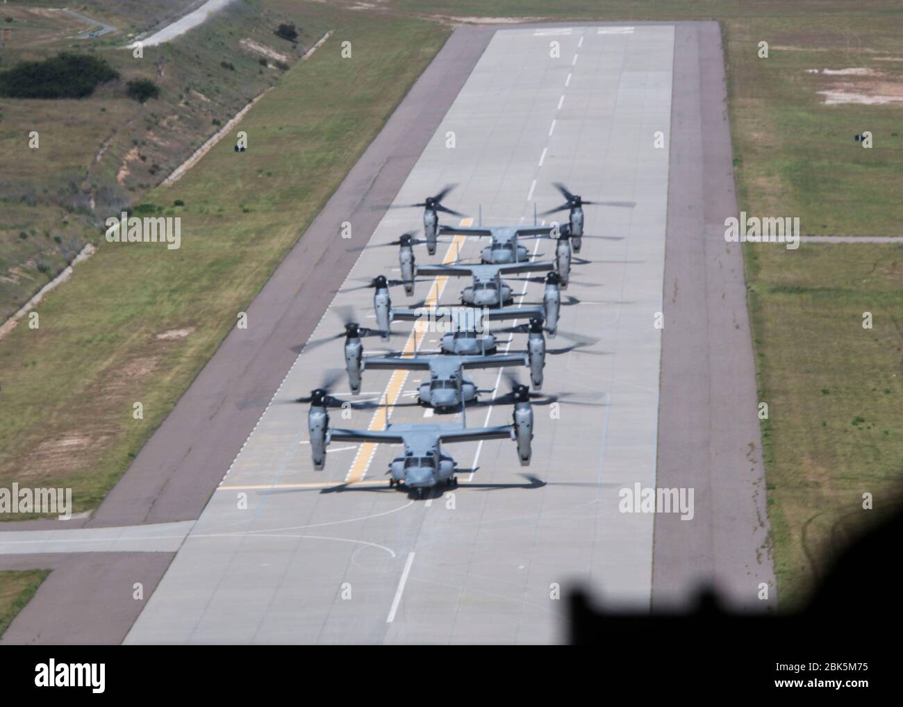 Five U.S. Marine Corps MV-22B Ospreys assigned to Marine Medium Tiltrotor Squadron (VMM) 362 ...