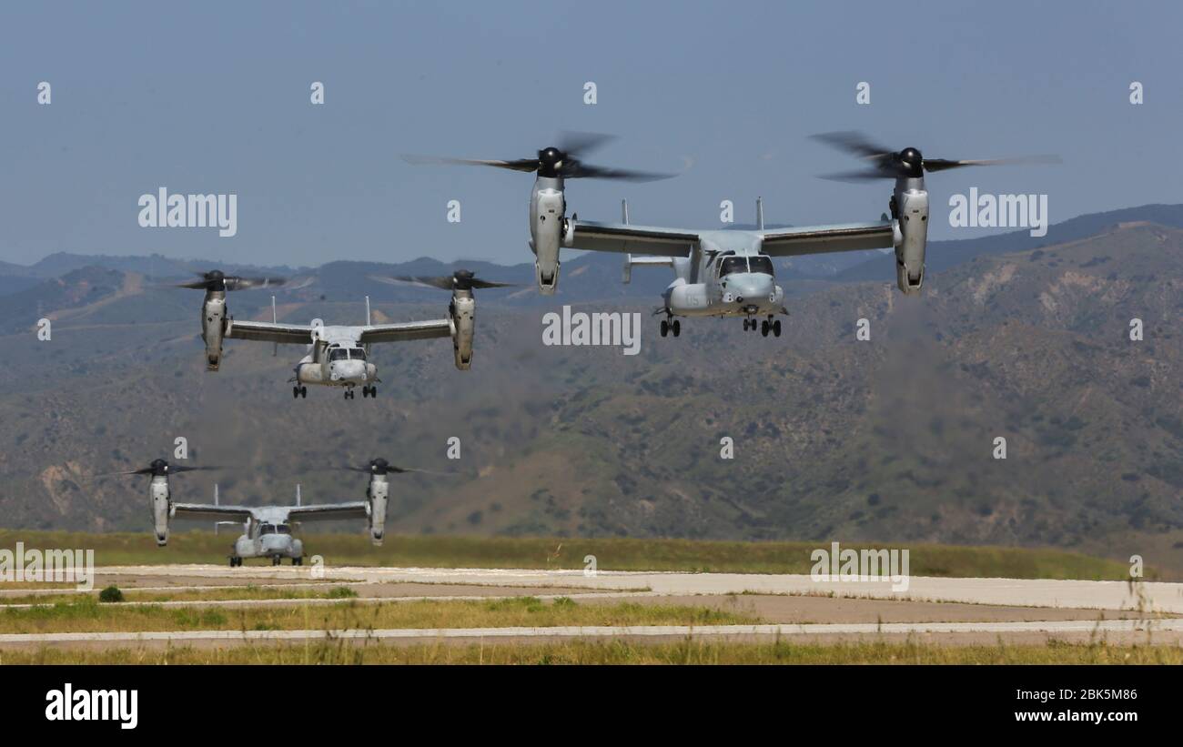Three U.S. Marine Corps MV-22B Ospreys assigned to Marine Medium Tiltrotor Squadron (VMM) 362 ...