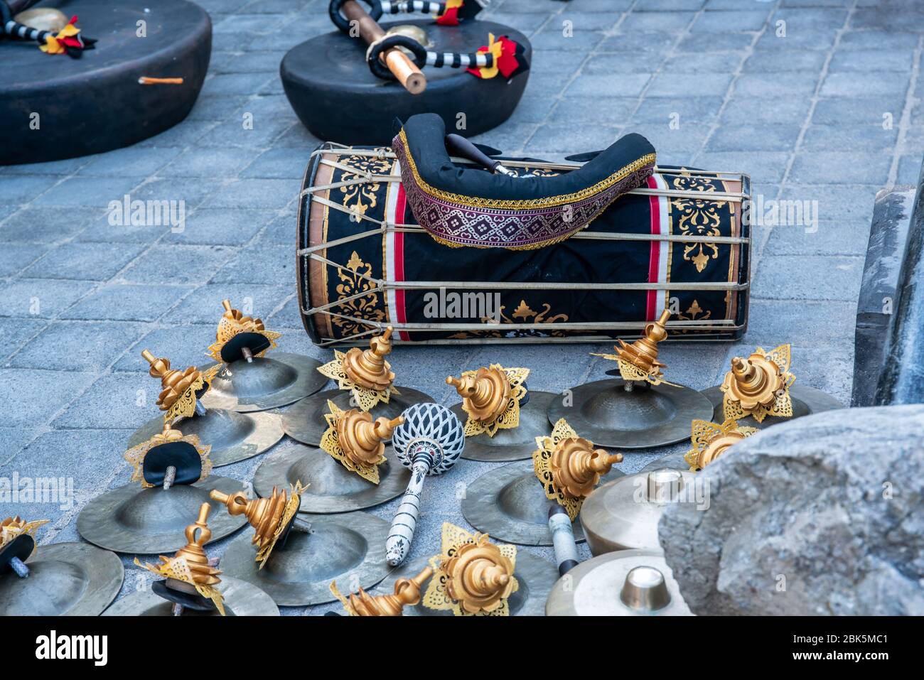 Traditional drums and other musical instruments on the ground to be ...