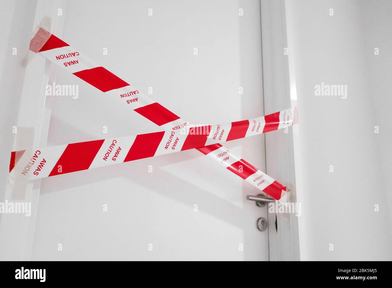 The entrance to the apartment is blocked by a protective tape. Crime ...