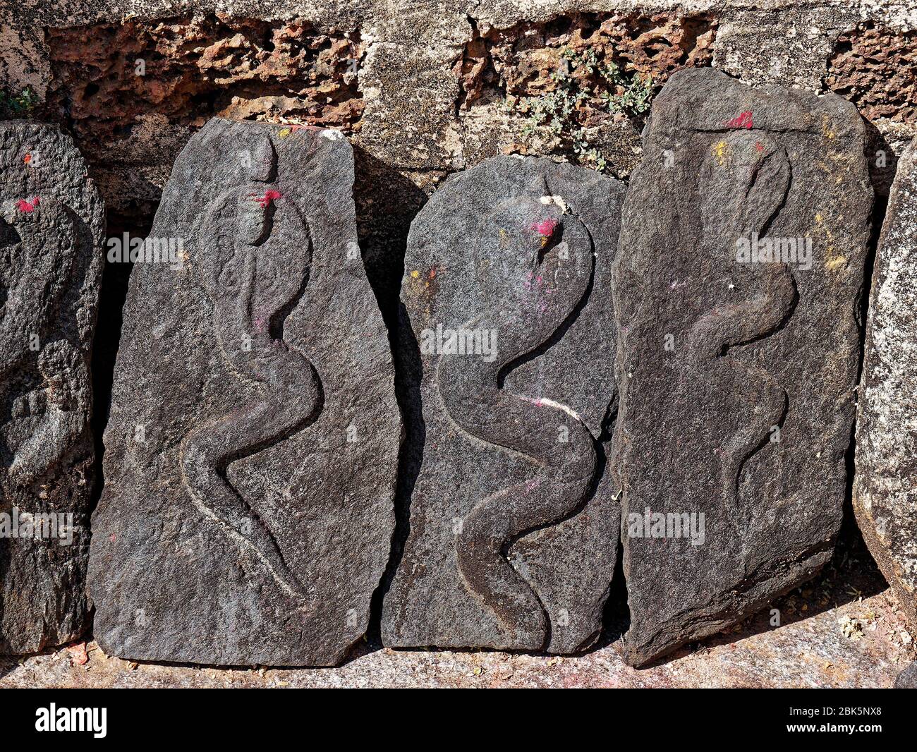 Relief carving of snake god Stock Photo - Alamy