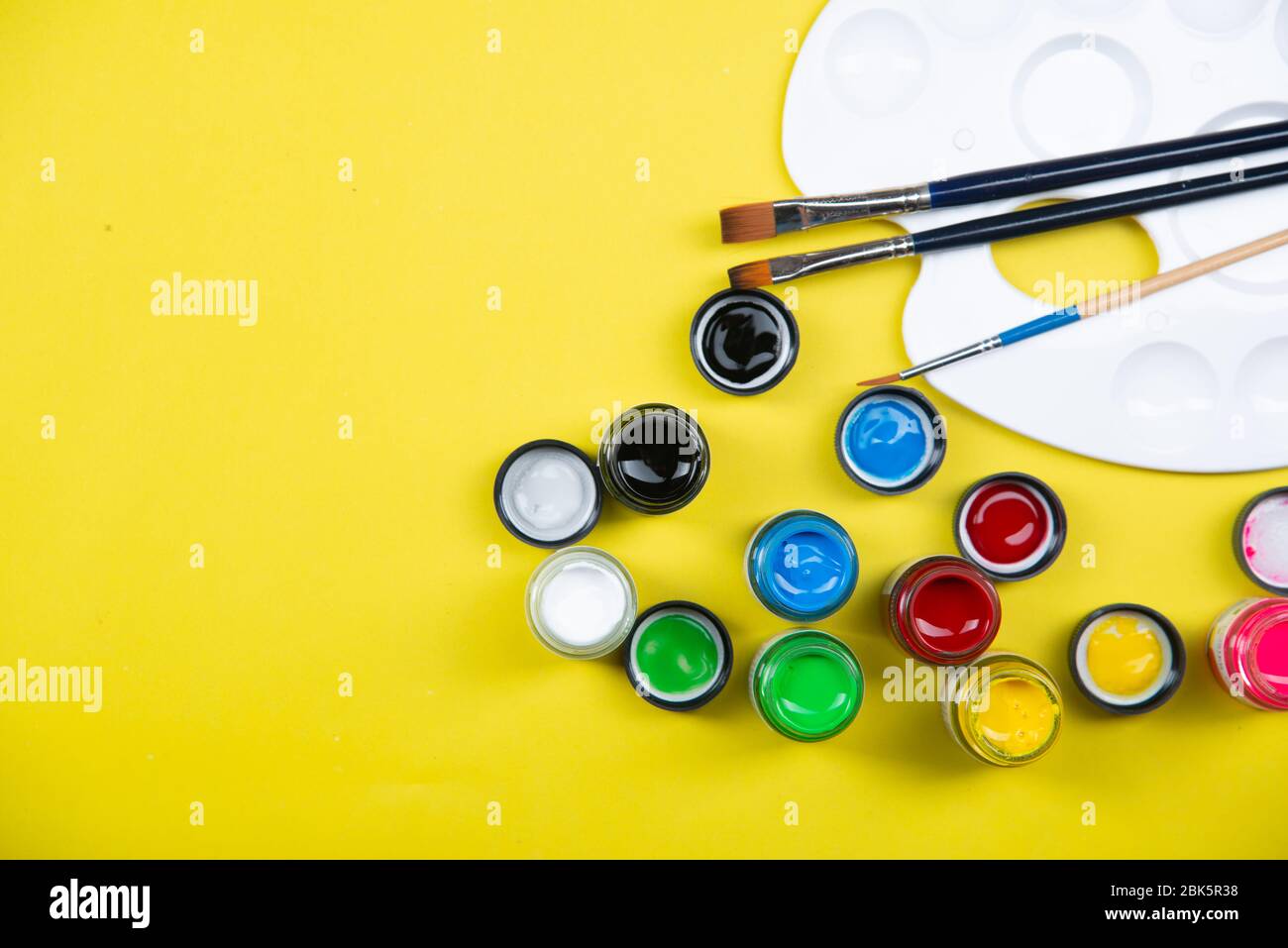 Colorful acrylic paints on plastic white pallet Stock Photo - Alamy