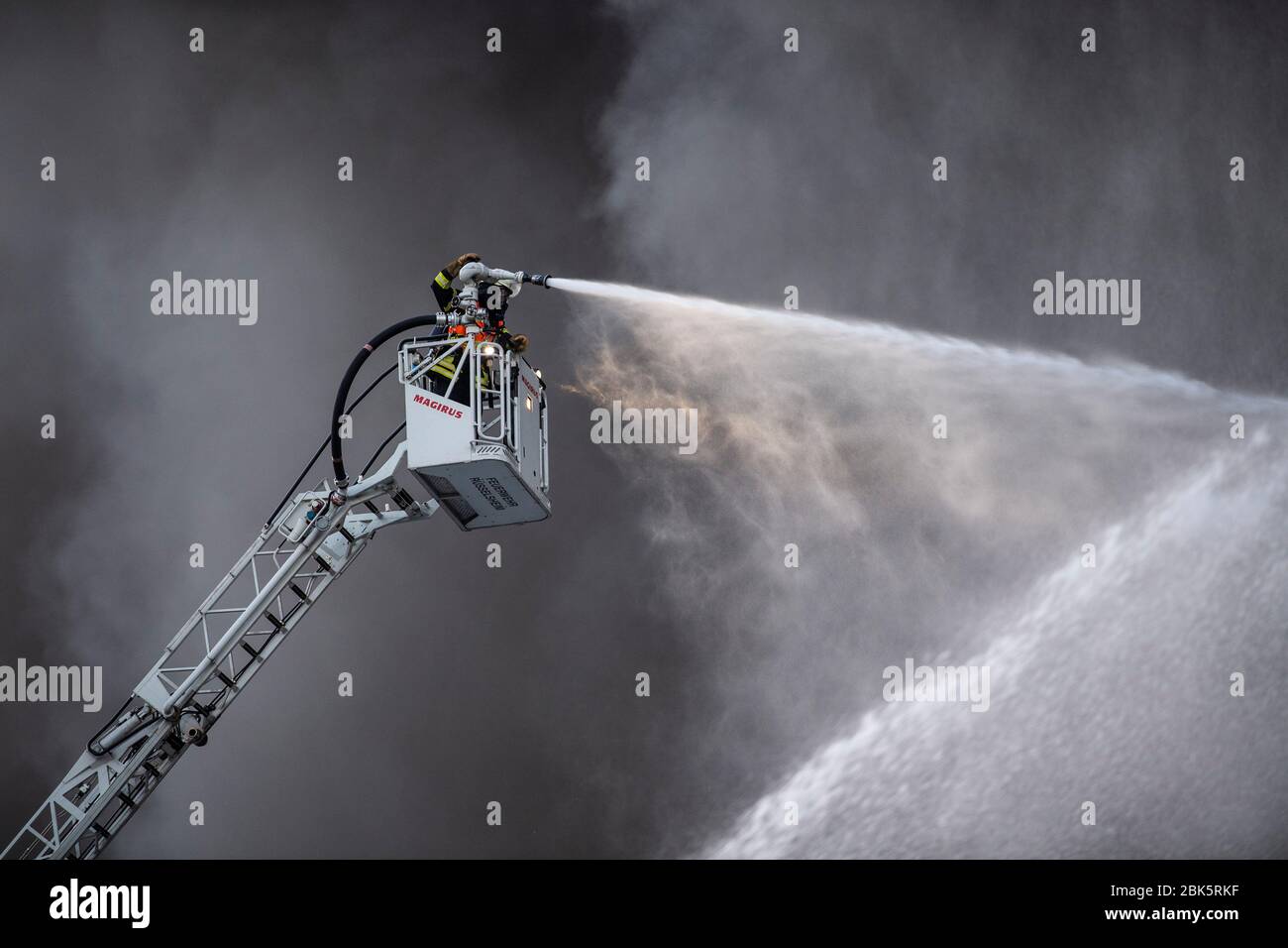 Ginsheim Gustavsburg, Germany. 02nd May, 2020. Firefighters fight a ...