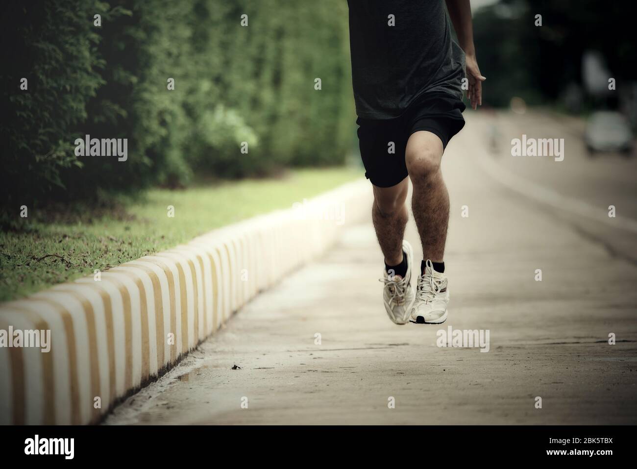 athlete standing on an all-weather running track Stock Photo - Alamy