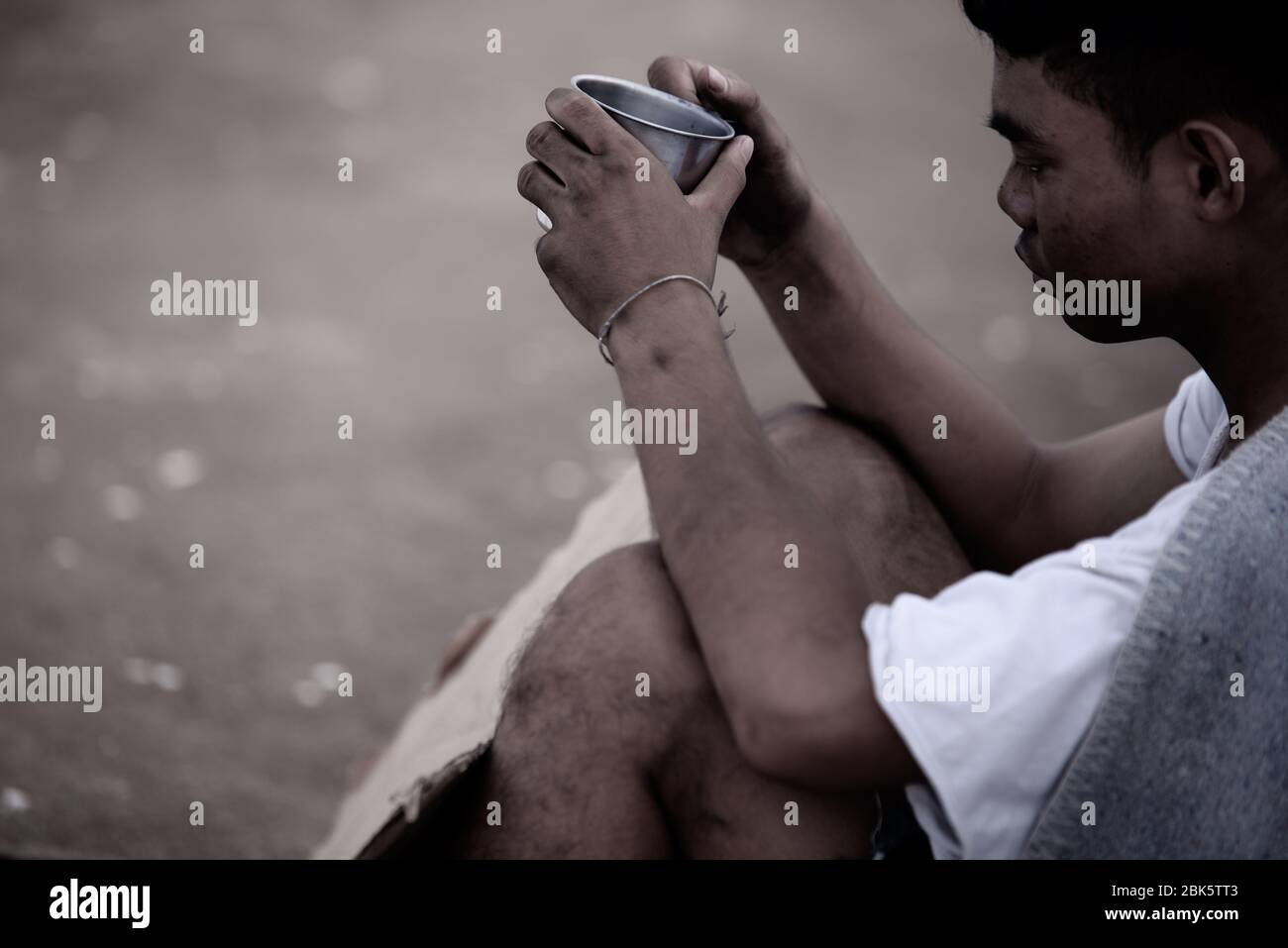 Boy begging alms hi-res stock photography and images - Alamy