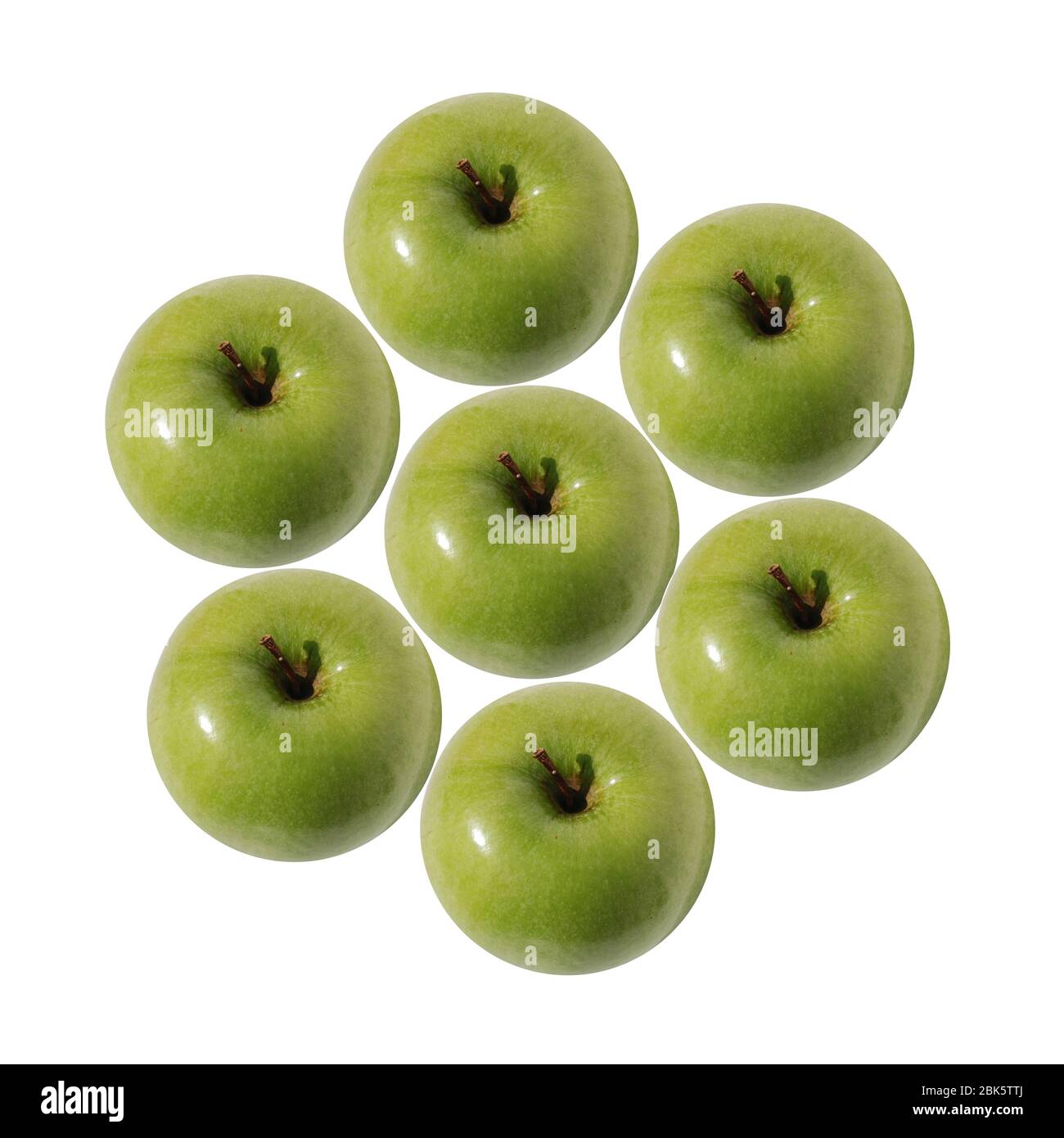 Seven green apples in a circle against a white background Stock Photo ...