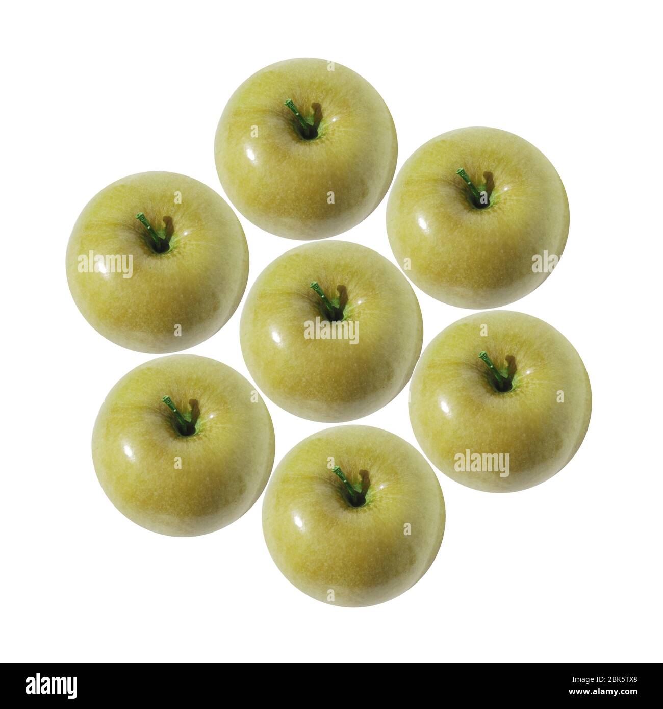 Seven yellow apples in a circle against a white background Stock Photo ...