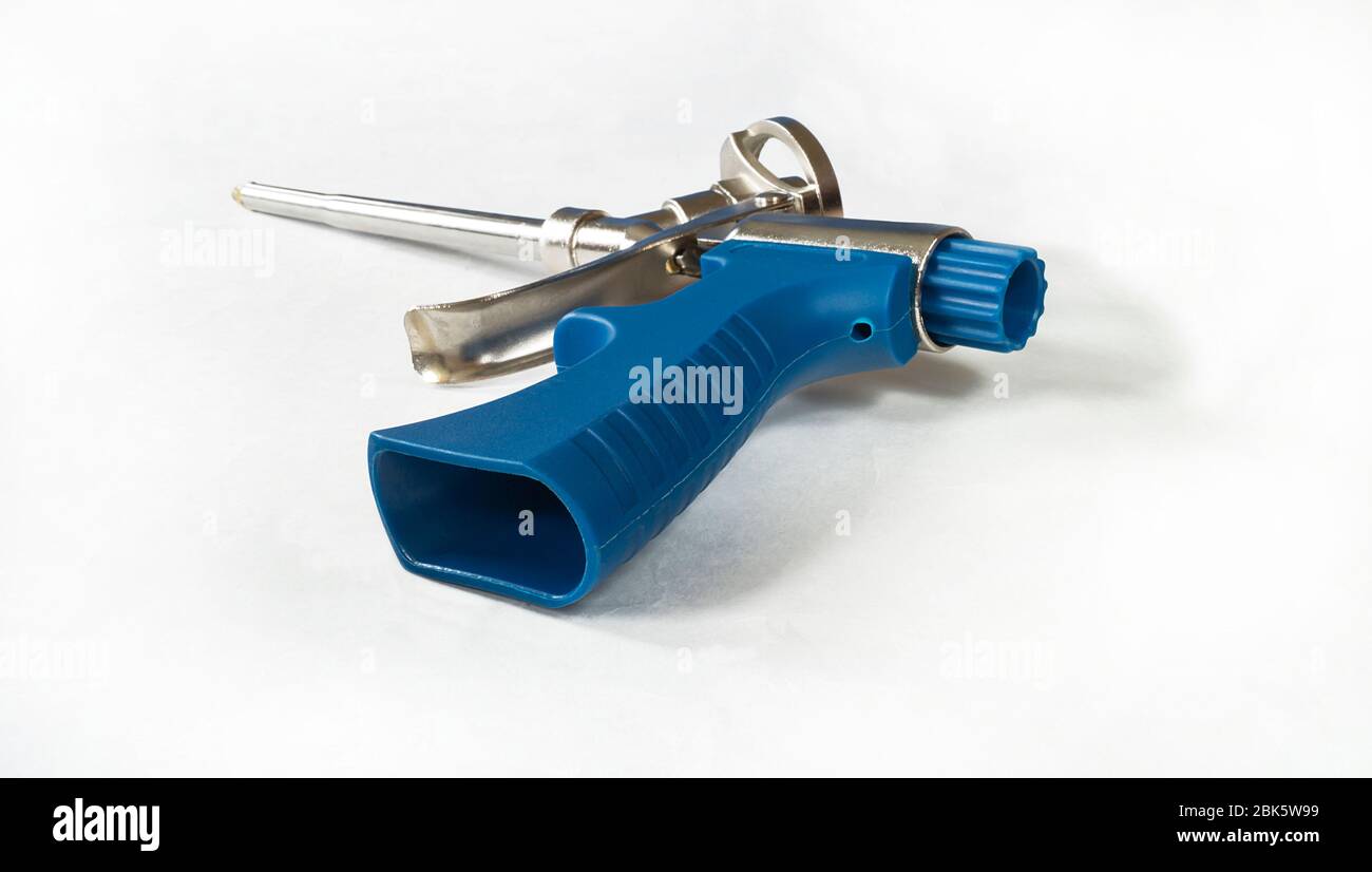 Instrument for construction foam on white background.Gun from become ...