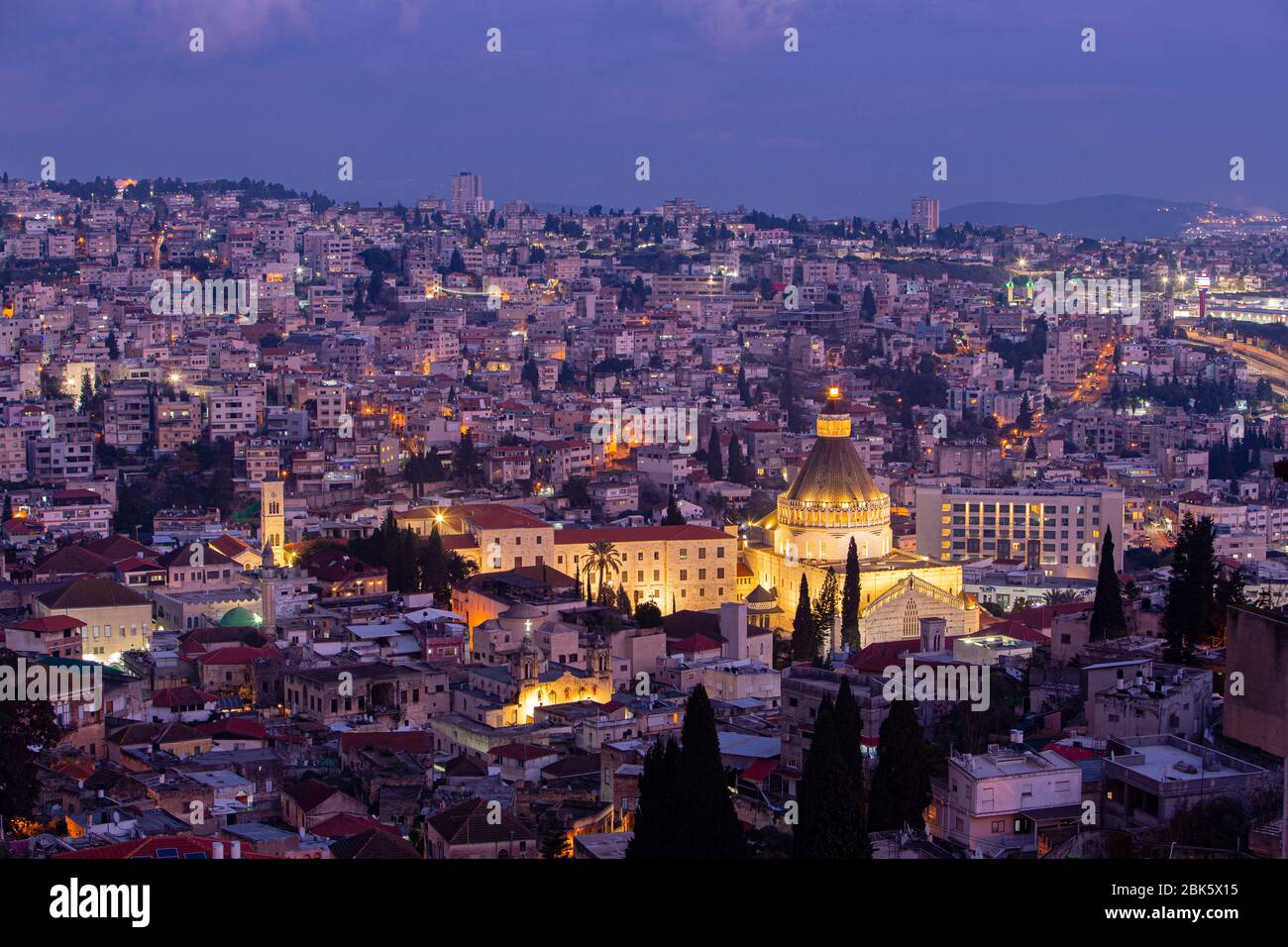 Biblical city of Nazareth and Basilica of the Annunciation at dusk ...