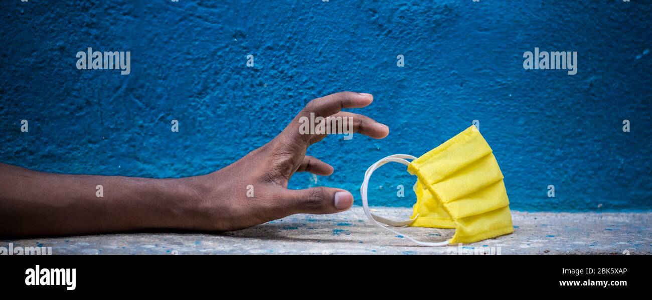 People needs face mask on isolated Blue background. Protection against ...