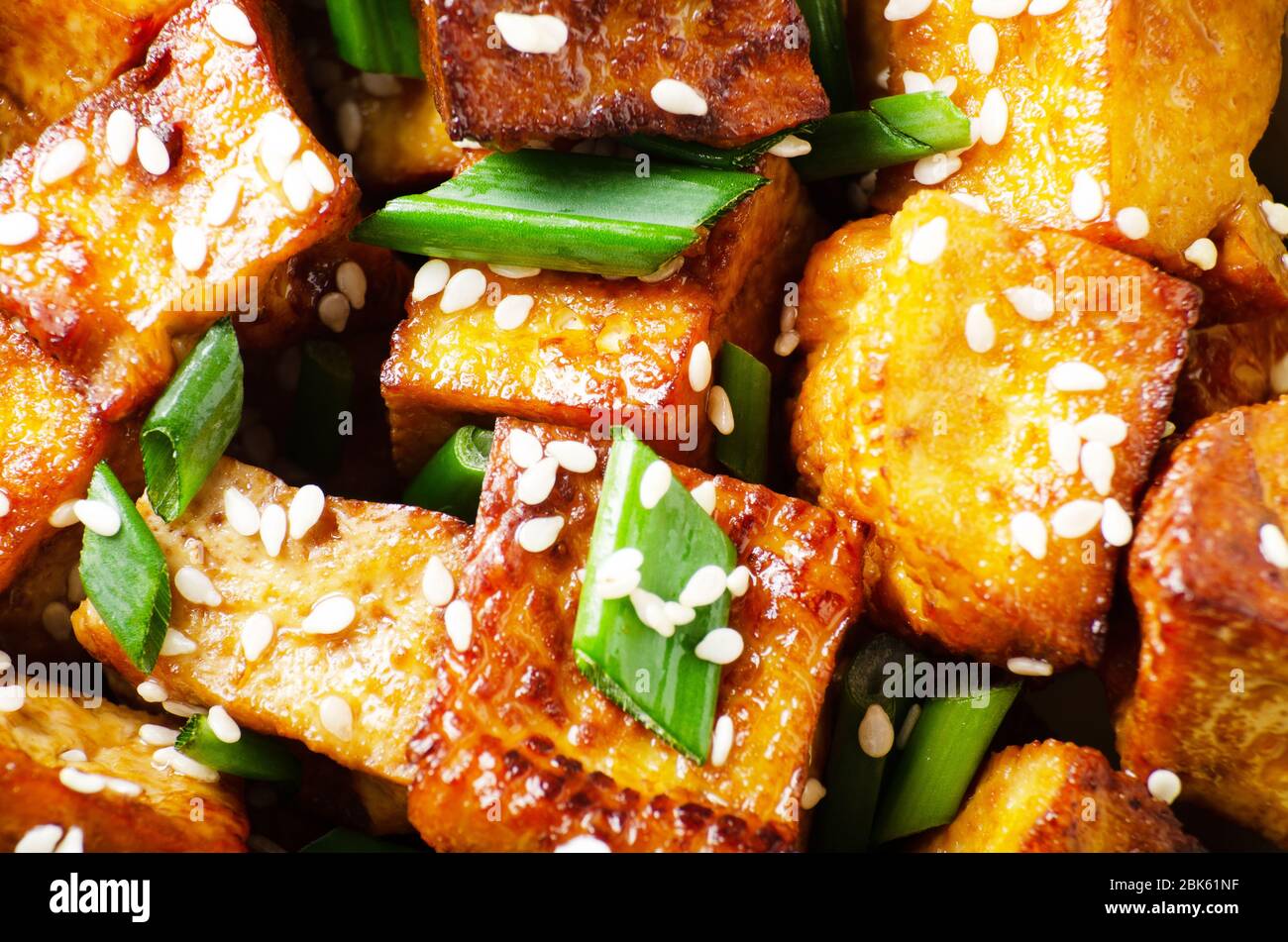 Flat lay background of Close Up view at crispy fried tofu pieces with ...