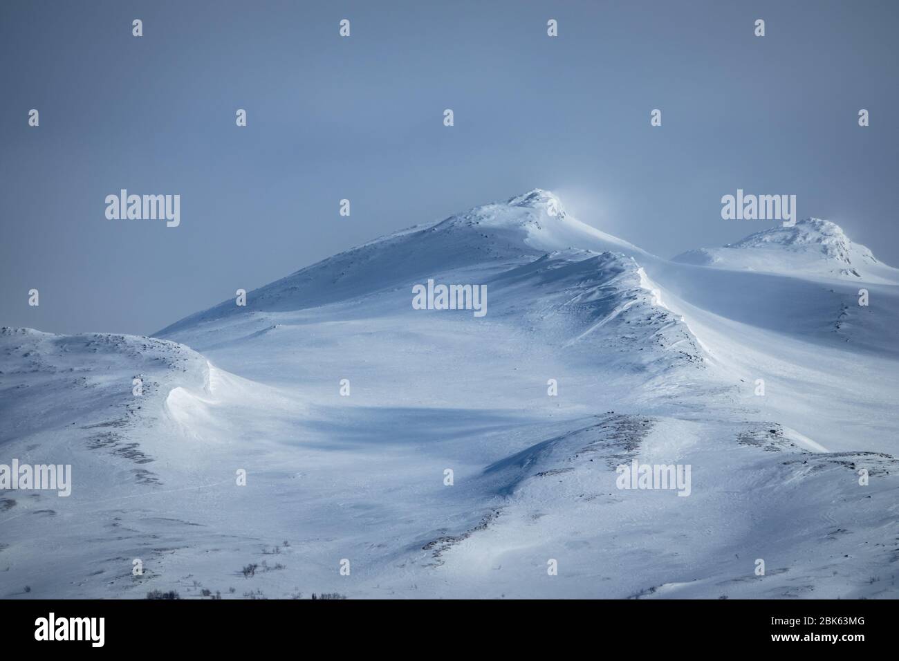 Winter landscape with dramatic snowy mountains Stock Photo - Alamy