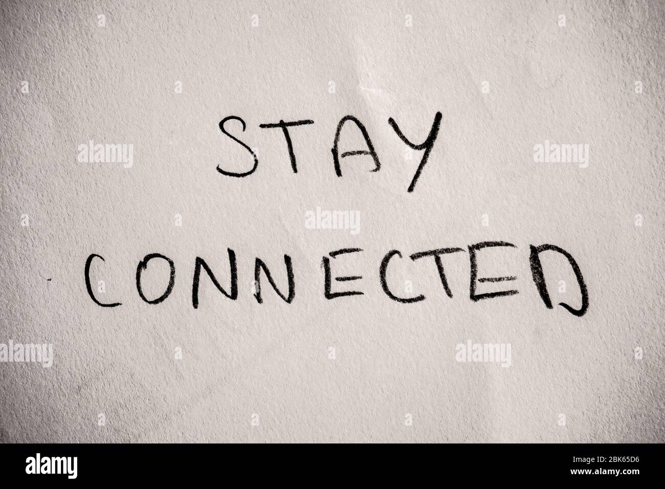 Stay connected- written on paper Stock Photo - Alamy