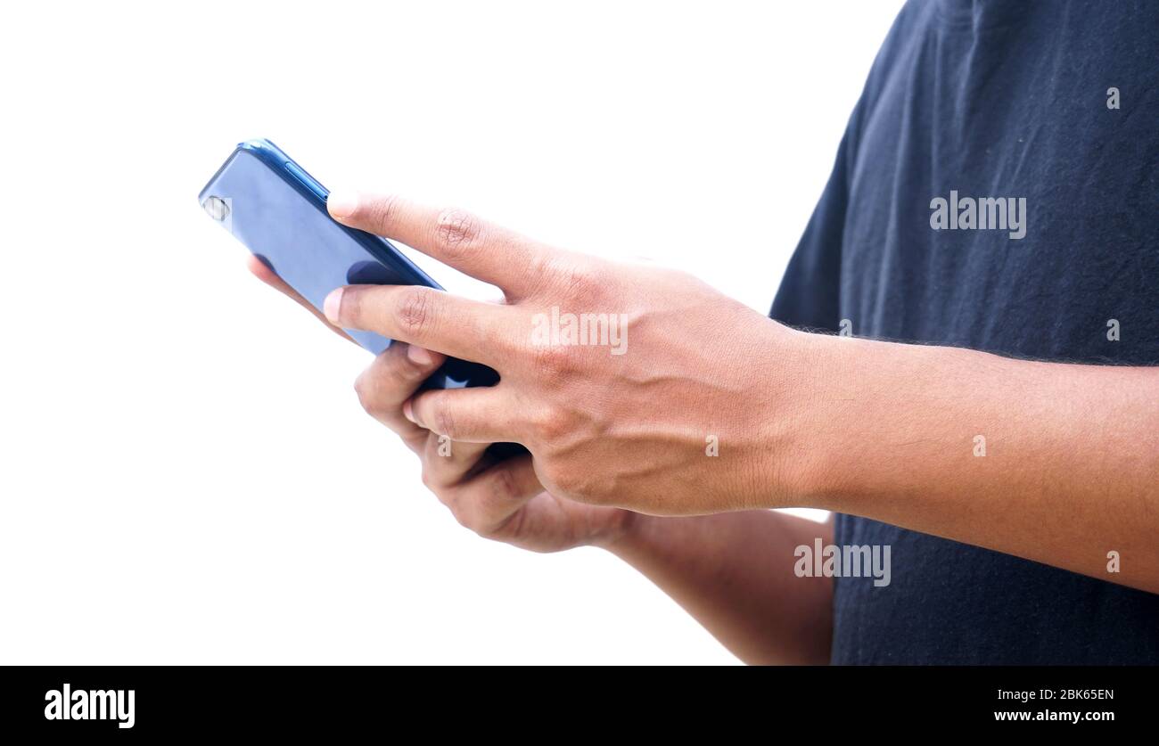 Young Indian man using smartphone Stock Photo - Alamy