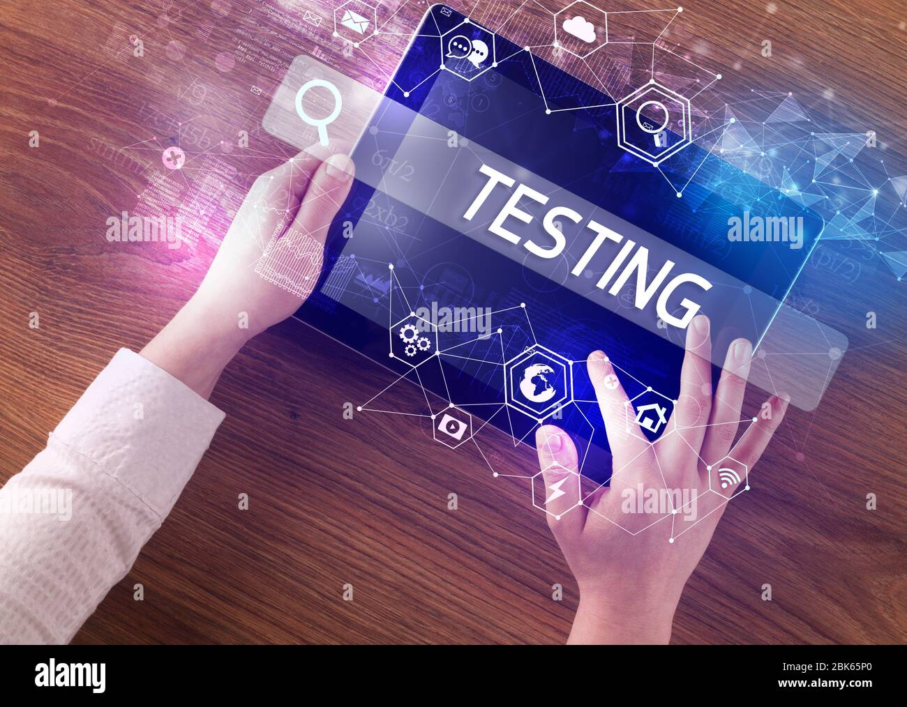 Close-up of a tablet searching TESTING inscription, hi-tech computing ...