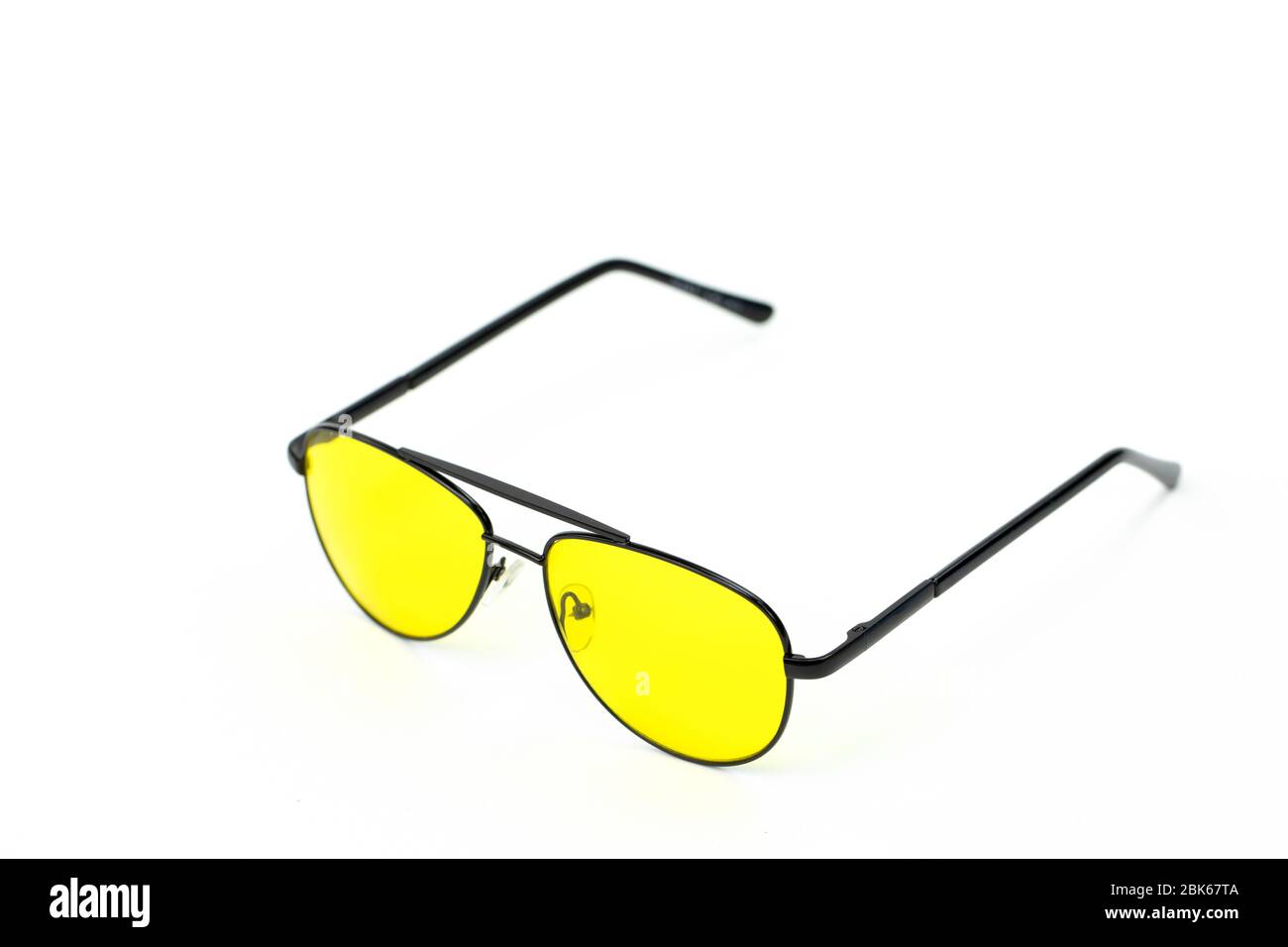 Yellow pilot's glasses in black frame isolated on white background ...