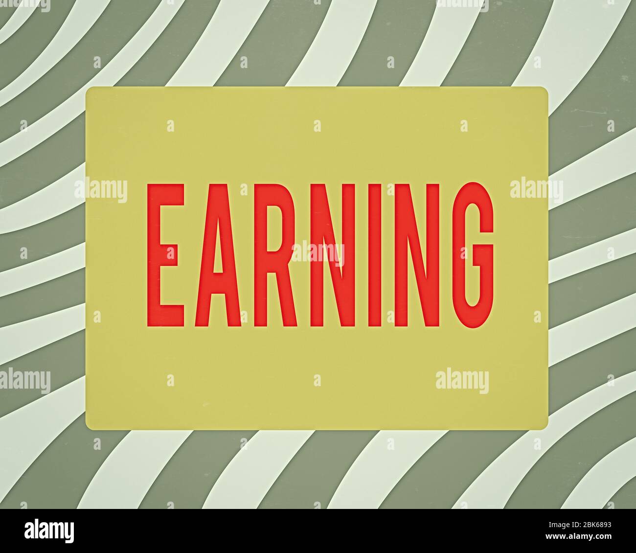 Writing note showing Earning. Business concept for something earned as ...