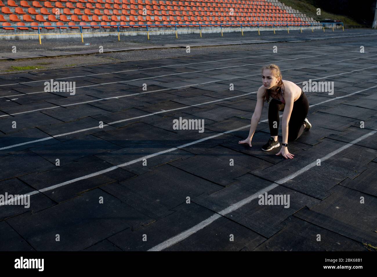 Women getting ready to start running in a stadium Stock Photo - Alamy