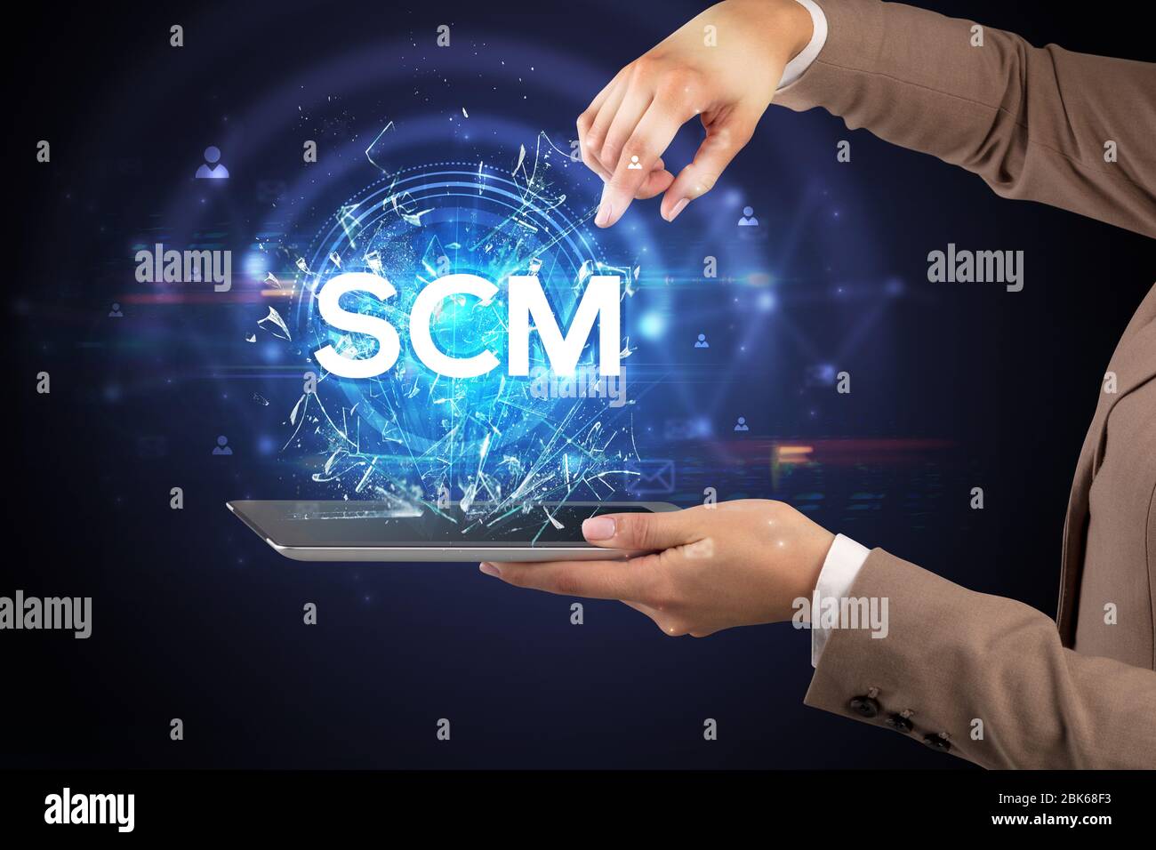 Close-up of a touchscreen with SCM abbreviation, modern technology ...