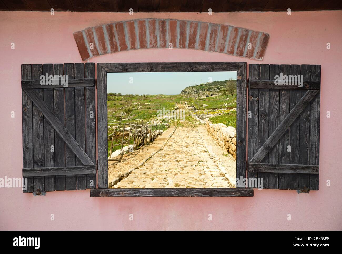 barn wood old window with brick on a pink wall Stock Photo - Alamy