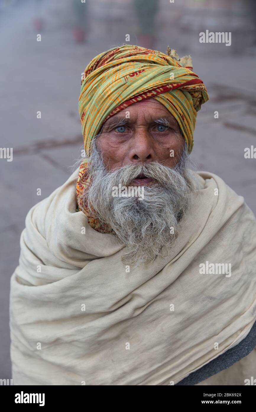 A portrait of a person having spiritual appearance on a bank of river ...
