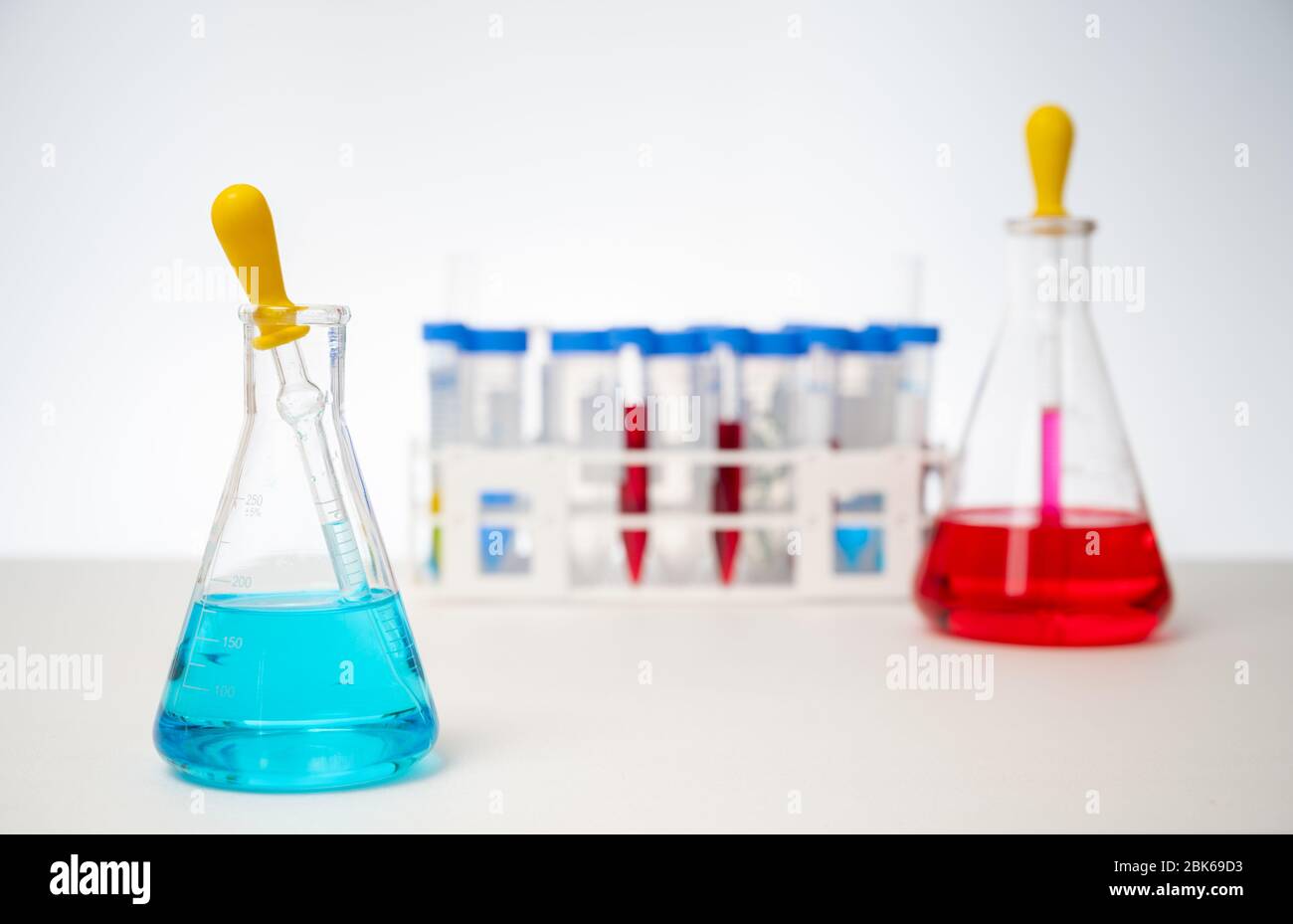 Any of the various tools and containers used in experiments on a white ...