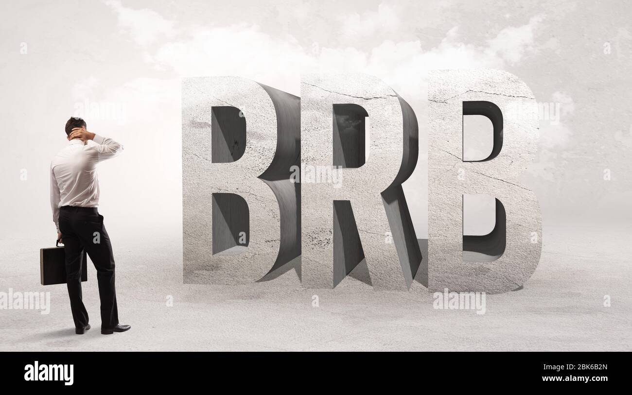 Rear view of a businessman standing in front of BRB abbreviation ...