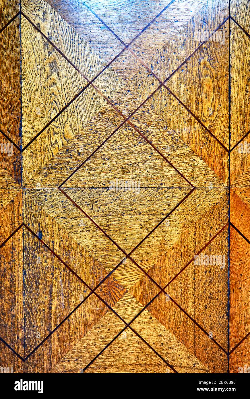 Antique old weathered wood floor parquet with diamond pattern as a ...