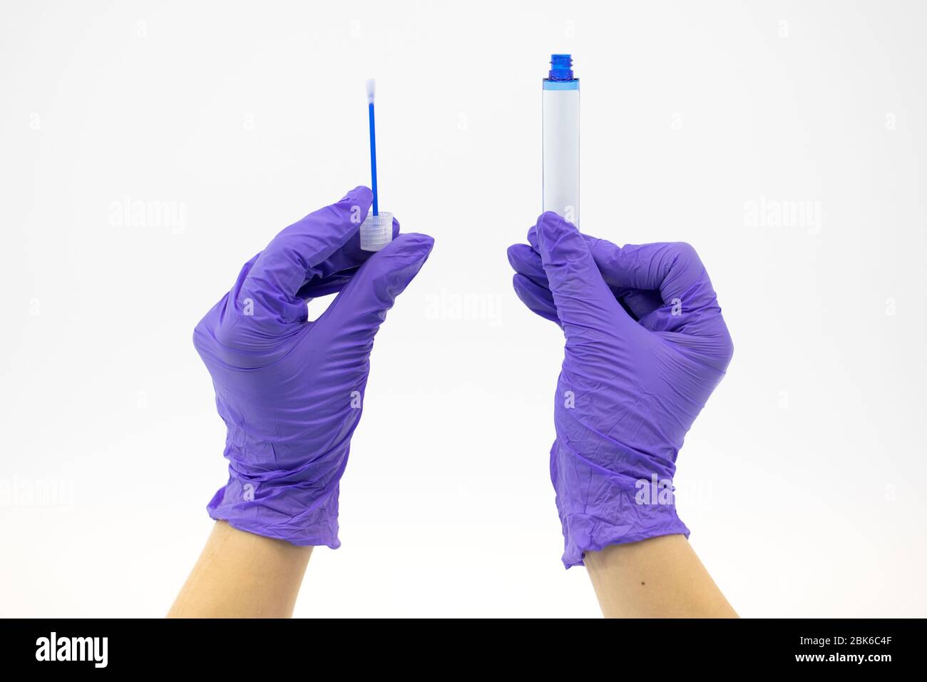 Lab tubes of biological samples with white blank label in doctor's ...