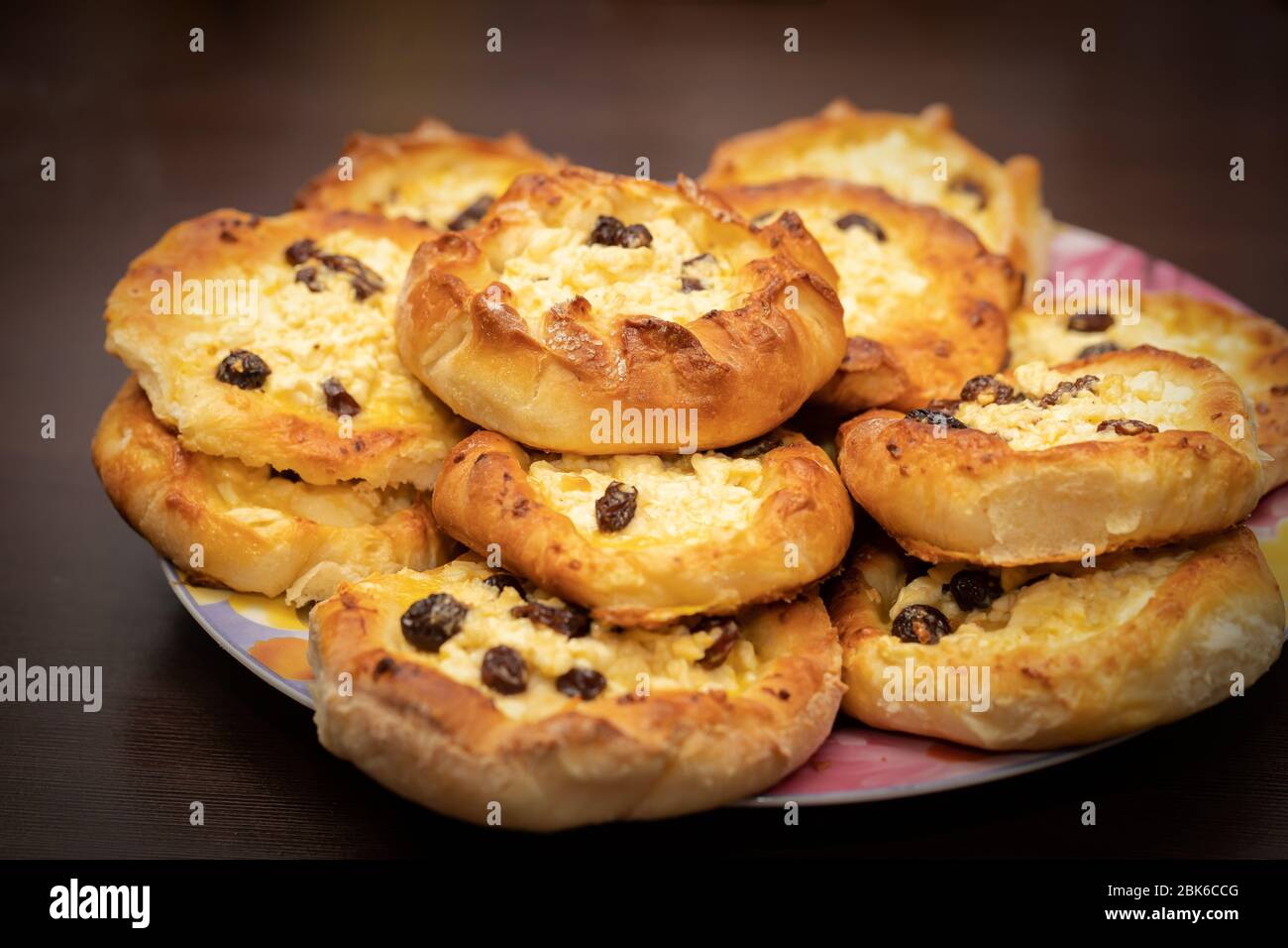 Fresh homemade open patties with cottage cheese (traditional Russian ...