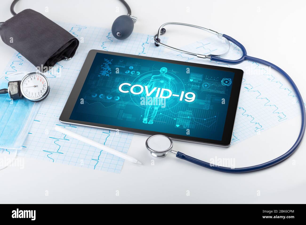 Tablet pc and doctor tools with COVID-19 inscription, coronavirus ...