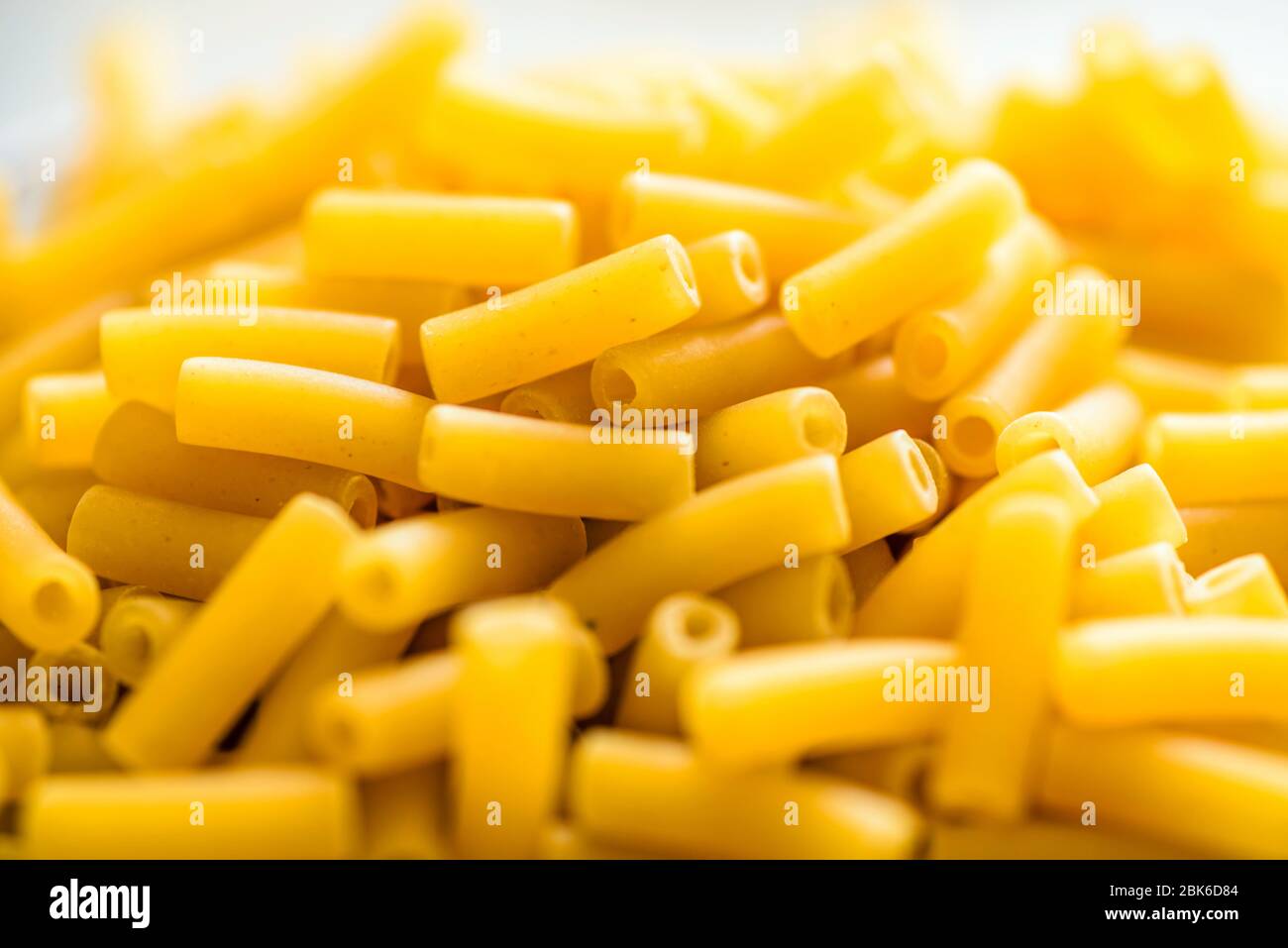 raw italian macaroni pasta close up view Stock Photo - Alamy