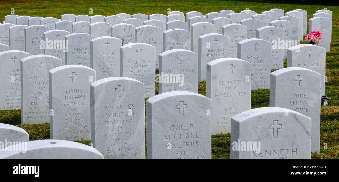 Tokens Left at Graves Stock Photo - Alamy