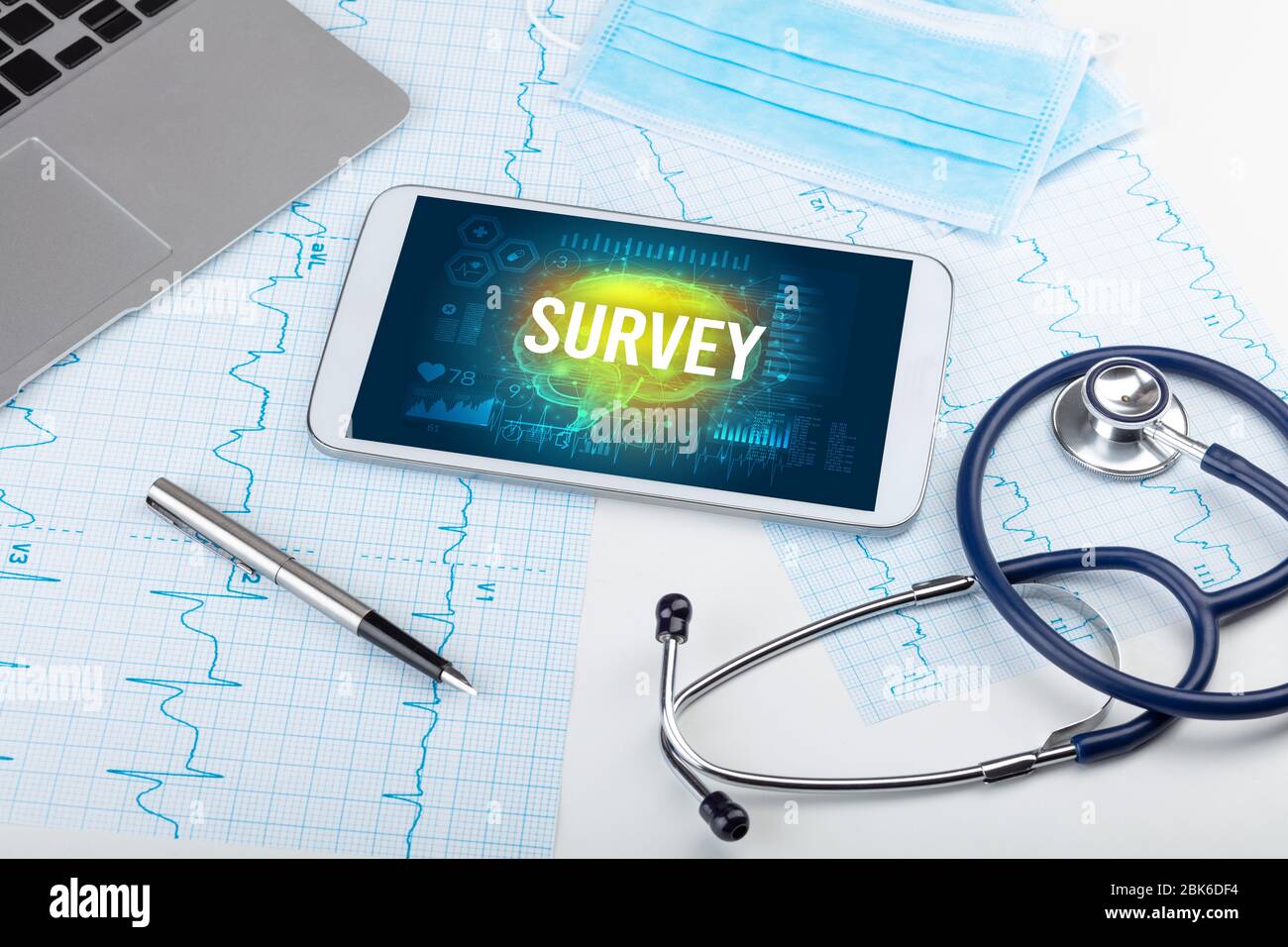 Tablet pc and medical tools with SURVEY inscription, social distancing ...