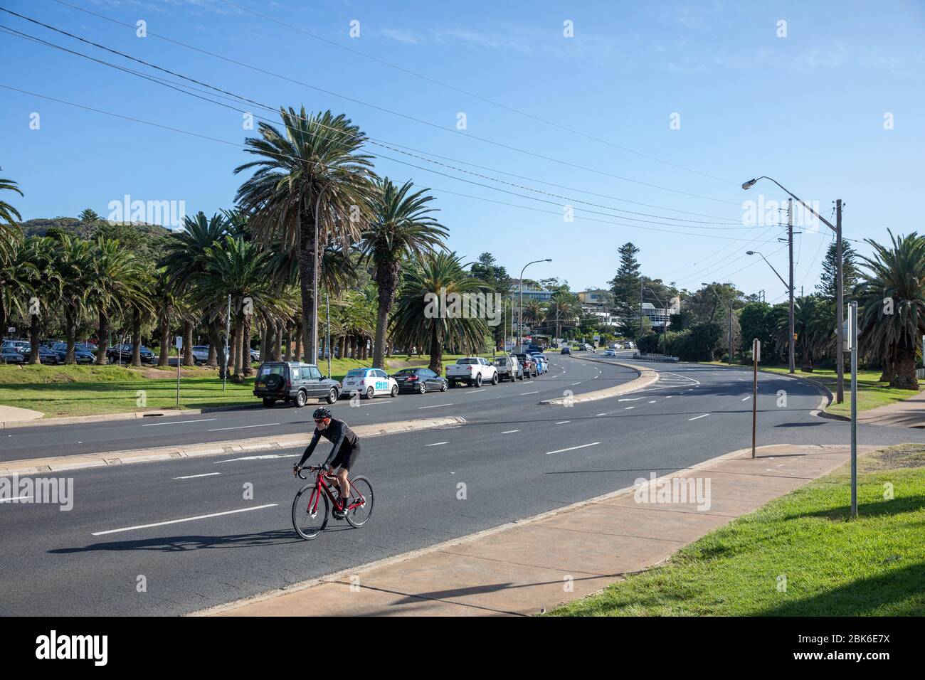 Man rid his road bike in Sydney during the covid 19 pandemic with few ...