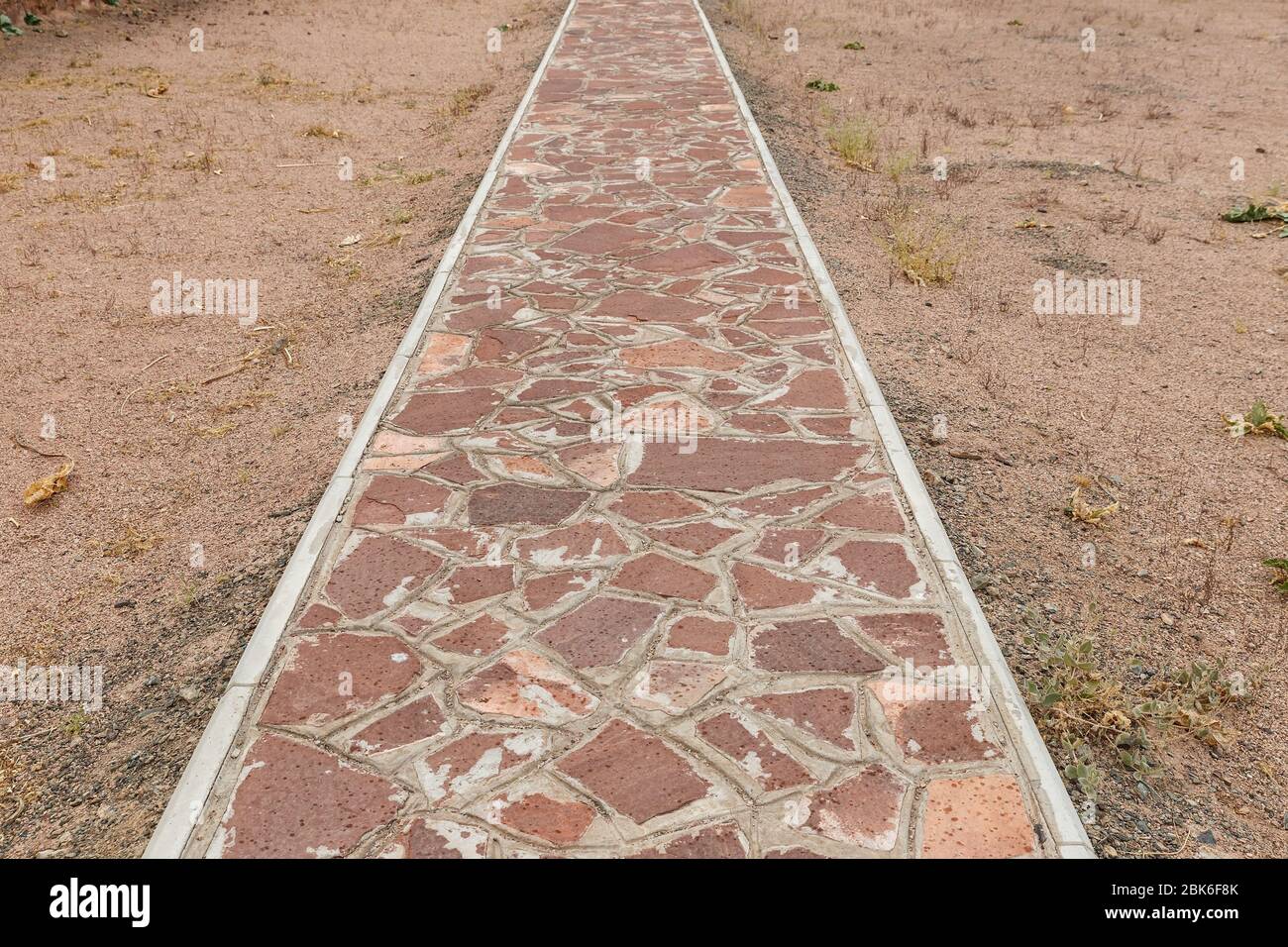 Akyrtas Palace Complex in Kazakhstan. The path of red stone on the ...