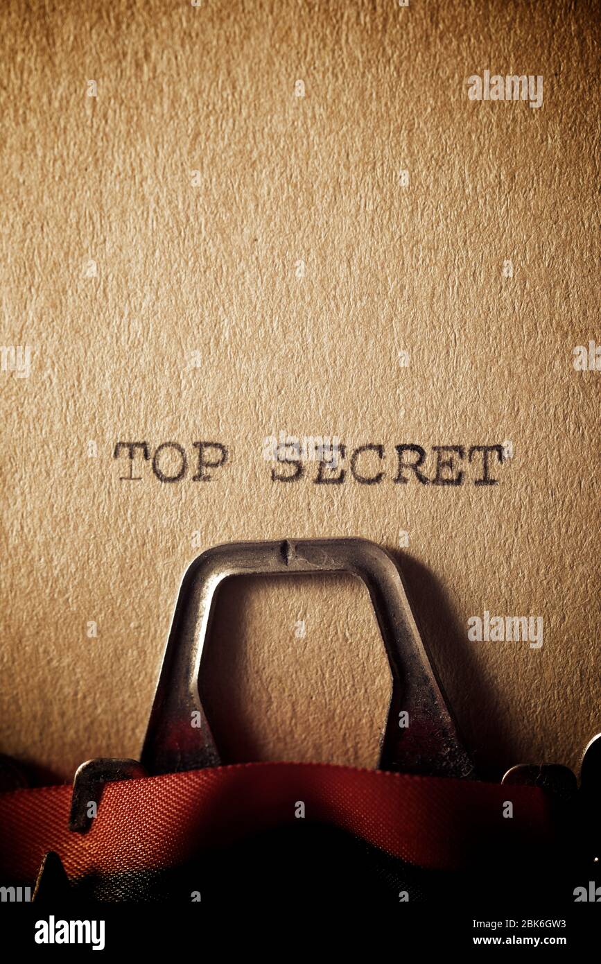 The sentence, Top Secret, written with a typewriter Stock Photo - Alamy