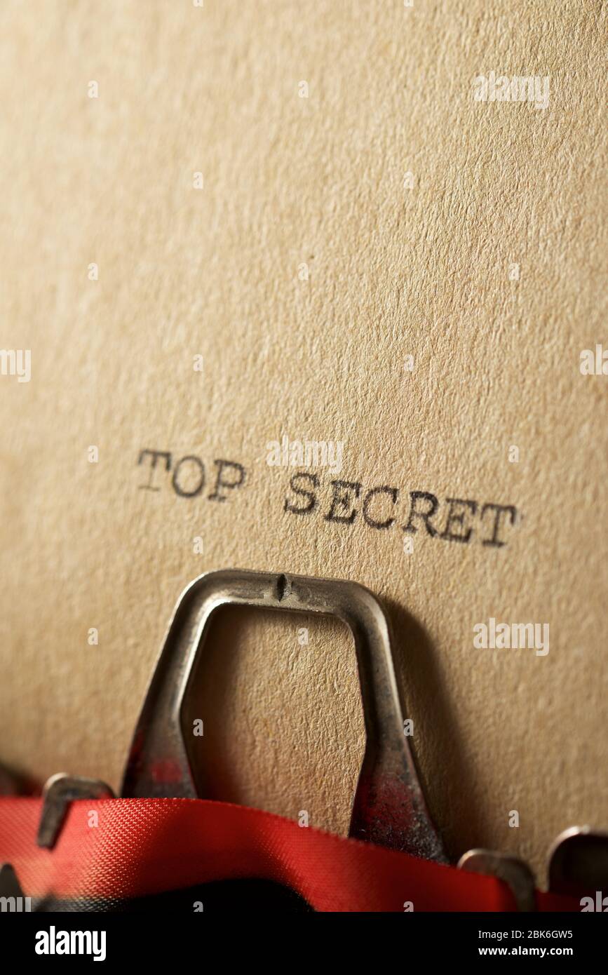 The sentence, Top Secret, written with a typewriter Stock Photo - Alamy