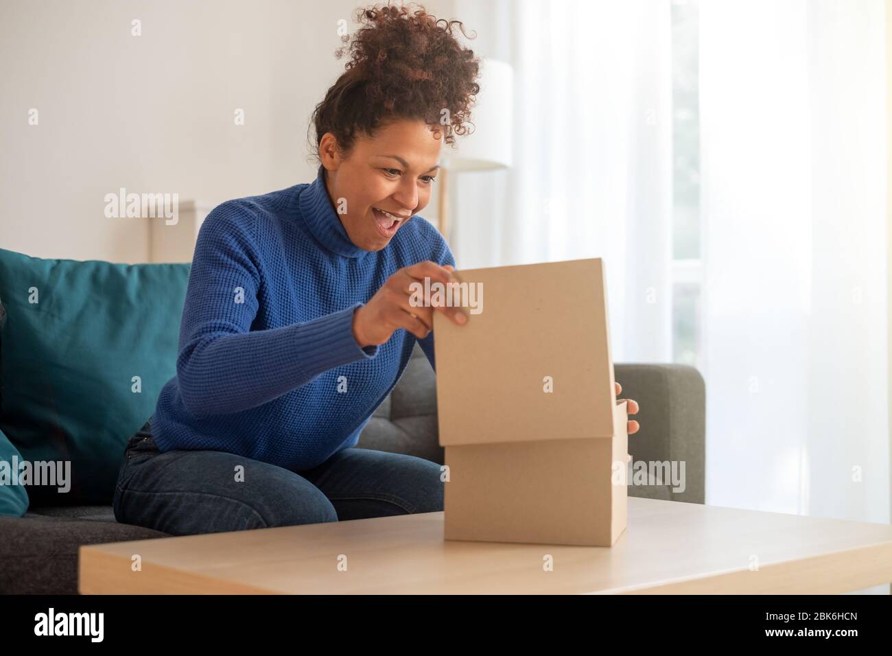 Unboxing package hi-res stock photography and images - Alamy