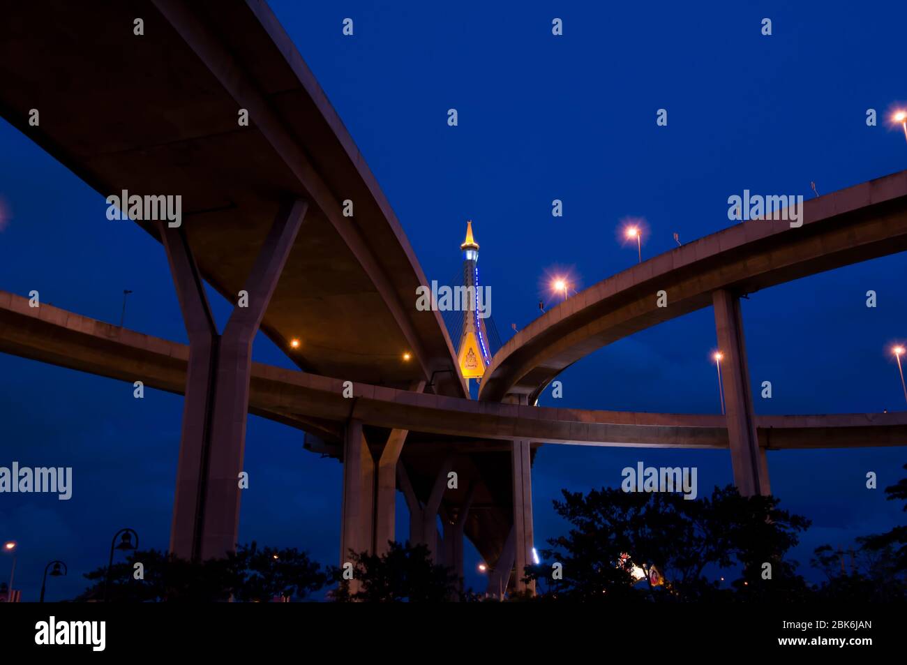 Crossing highway bridge in twilight Stock Photo - Alamy